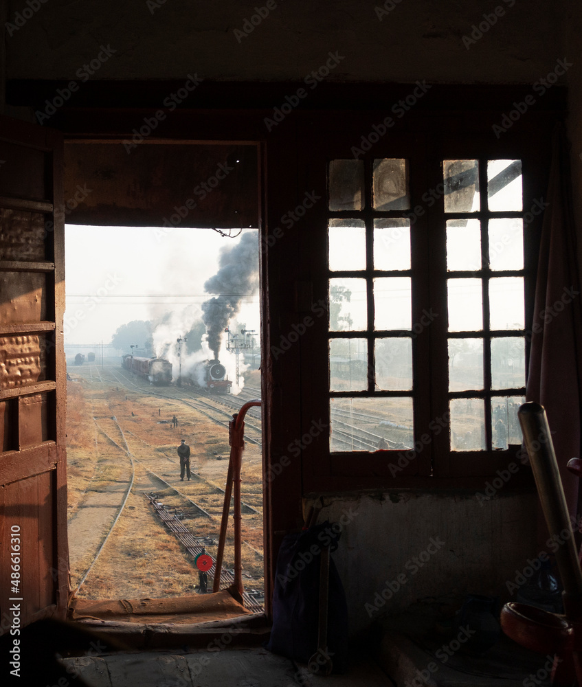 A Steam Train framed through the window of a signal cabin Stock Photo ...