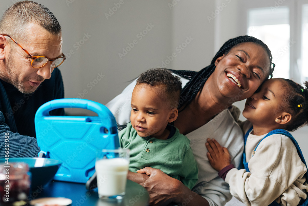Family Watching Cartoons Stock Photo | Adobe Stock