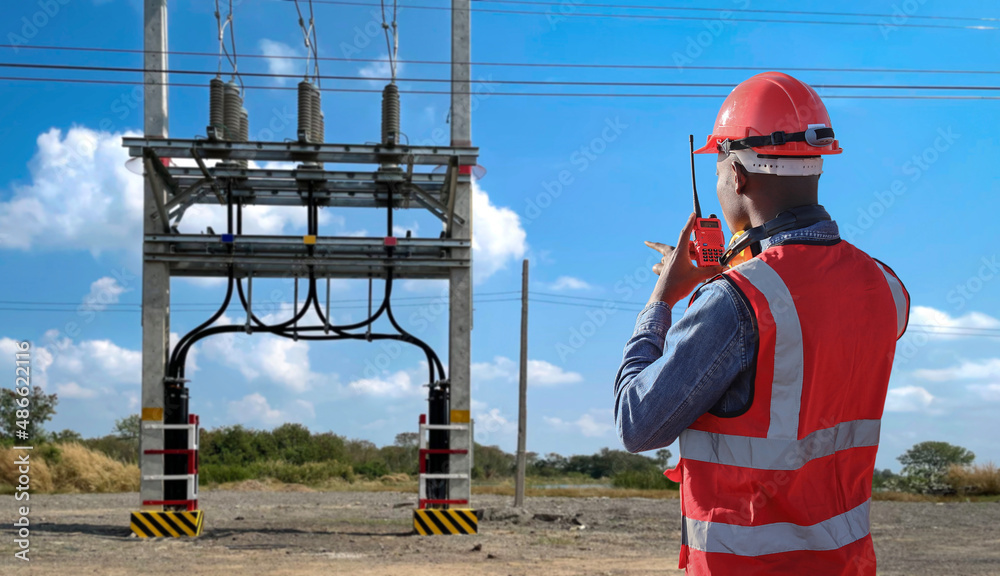 Electrical engineer man pointing and planing renewable energy ...