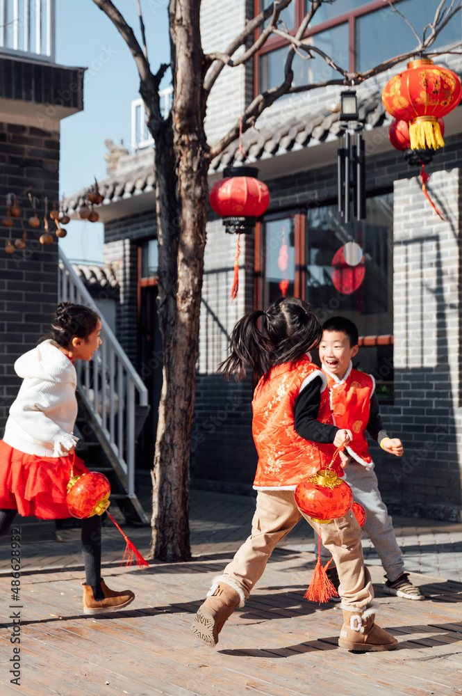 Happy kids playing in the yard Stock Photo | Adobe Stock