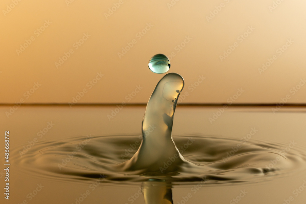 Water drop splash looking like a thumb sticking out of the water Stock ...