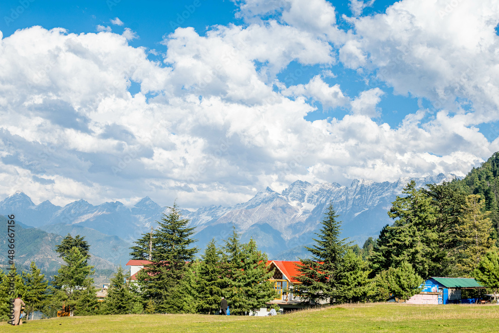 Blue Sky with full of White Clouds, and green trees, and the mountain ...