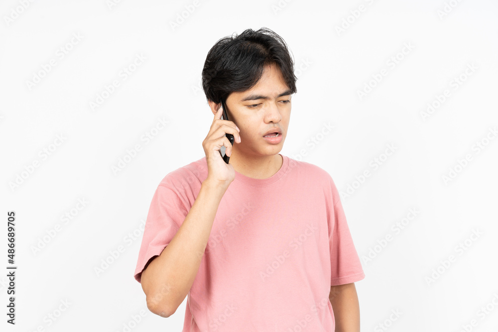 Talking on the phone with serious angry face expression of asian man ...