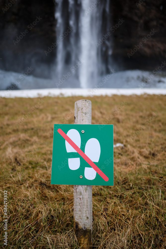 "Dont walk" warning signs at Seljalandsfoss waterfall, South Iceland ...