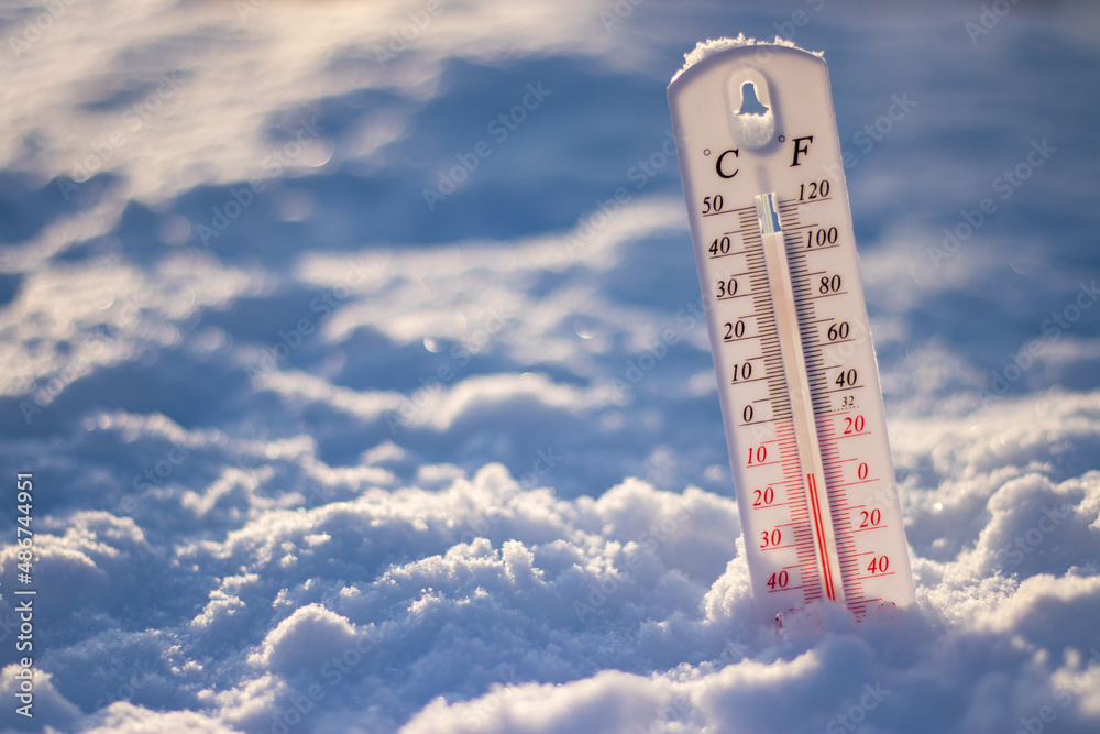 Thermometer in the snow. Extreme cold temperature at winter Stock Photo ...
