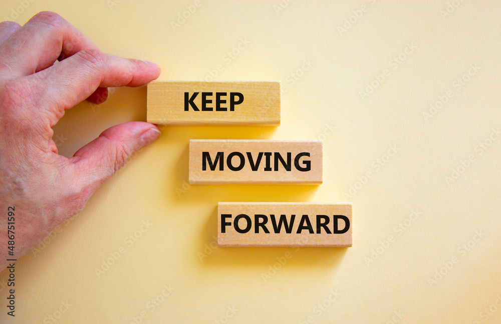 Keep moving forward symbol. Concept words Keep moving forward on blocks ...