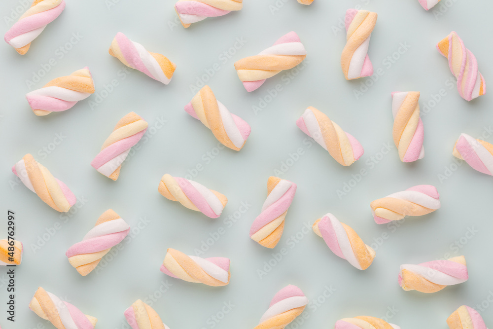 Colorful marshmallows on pastel background. Stock Photo | Adobe Stock
