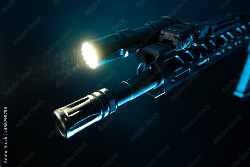 detailed shot dark bold black ar-15 rifle side profile with blue ...