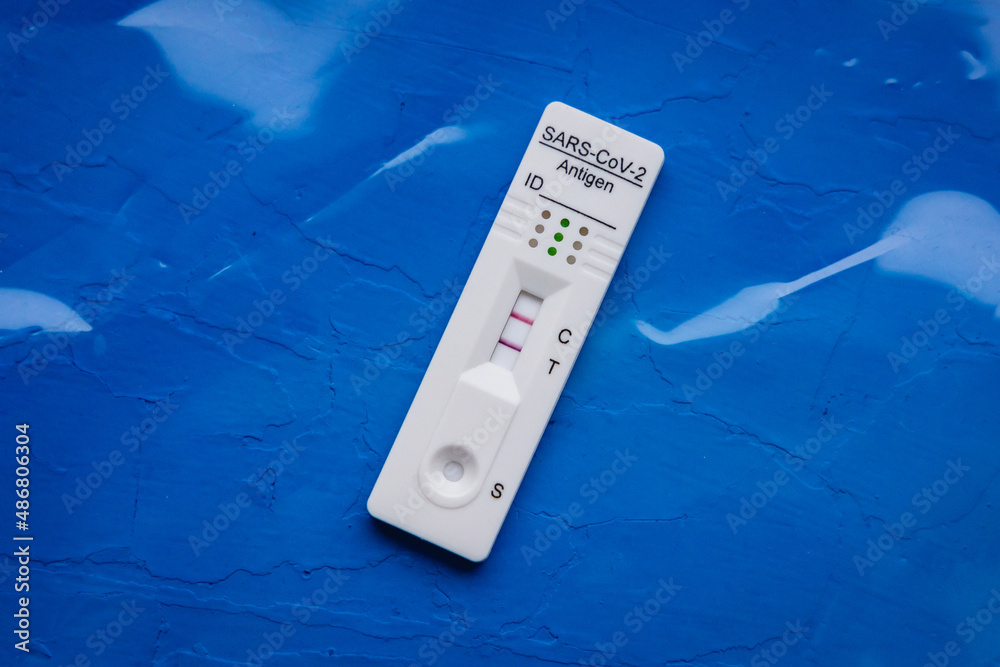 SARS-CoV-2 rapid antigen test with two colored lines - positive result ...