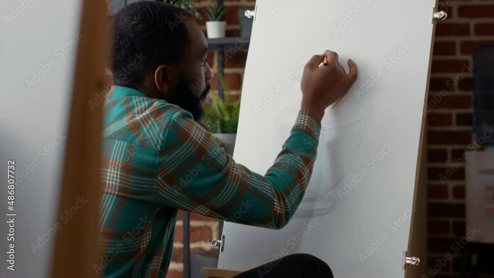 Young student creating vase drawing with pencil on canvas, developing ...