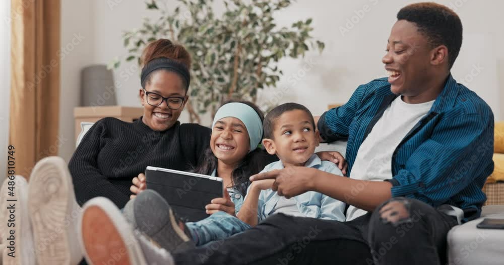Loving each other wonderful family sits comfortably on couch, embrace ...