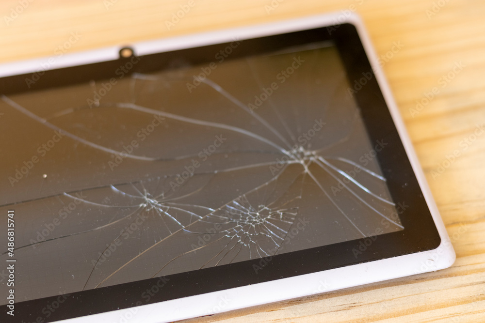 Broken screen of a tablet device Stock Photo | Adobe Stock
