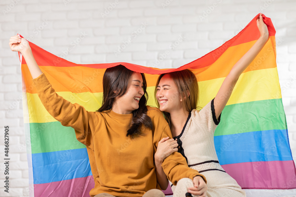 Lgbtq Asian Lesbian Young Couple Smiling Holding Pride Flag Happiness