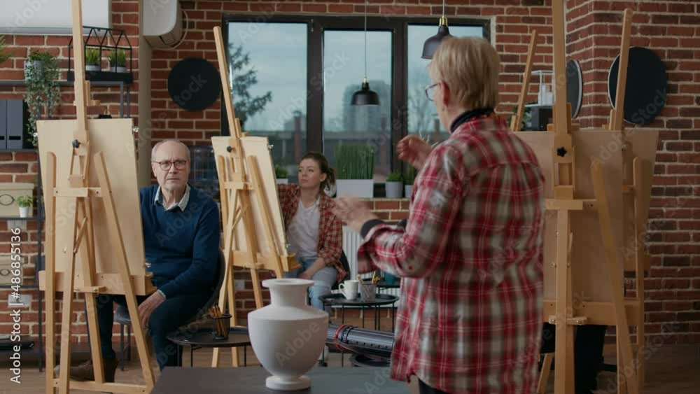 Multiethnic group of people attending art class lesson to learn new ...