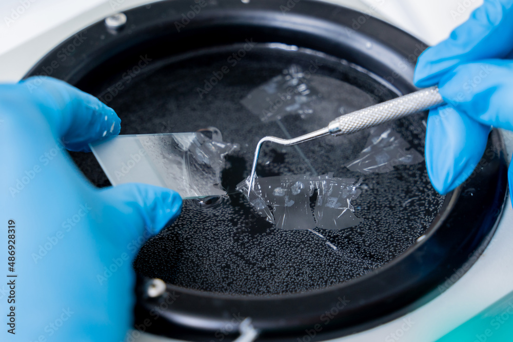 Laboratory Assistant Works On A Rotary Microtome Section And Making Microscope Slides Stock