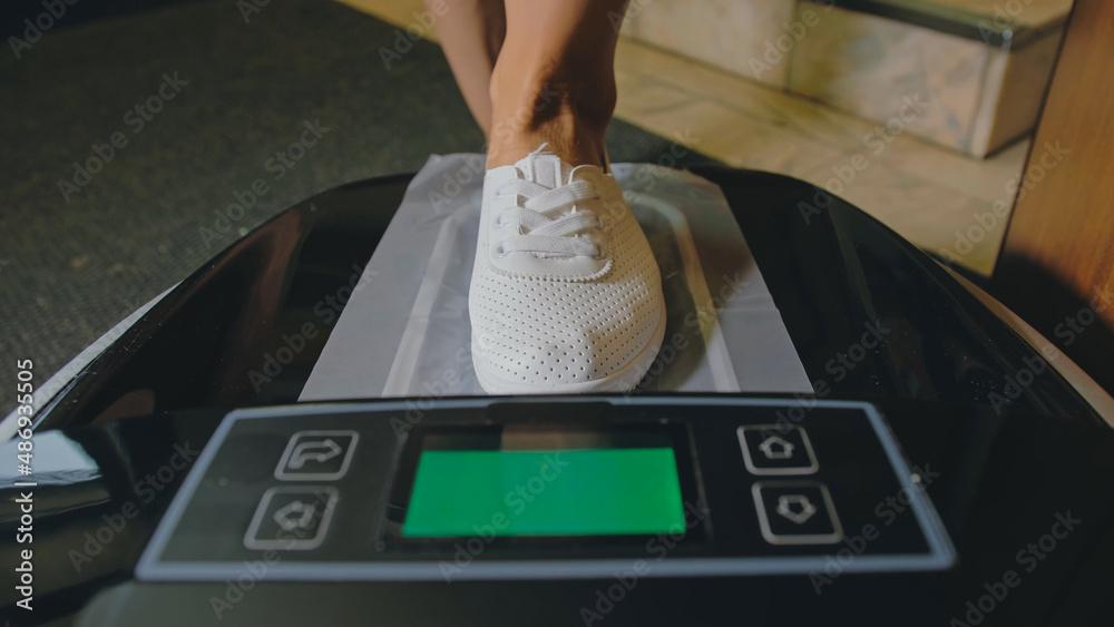 Automatic Thermal Shrinkable Shoe Cover Laminating Machine. Close up ...