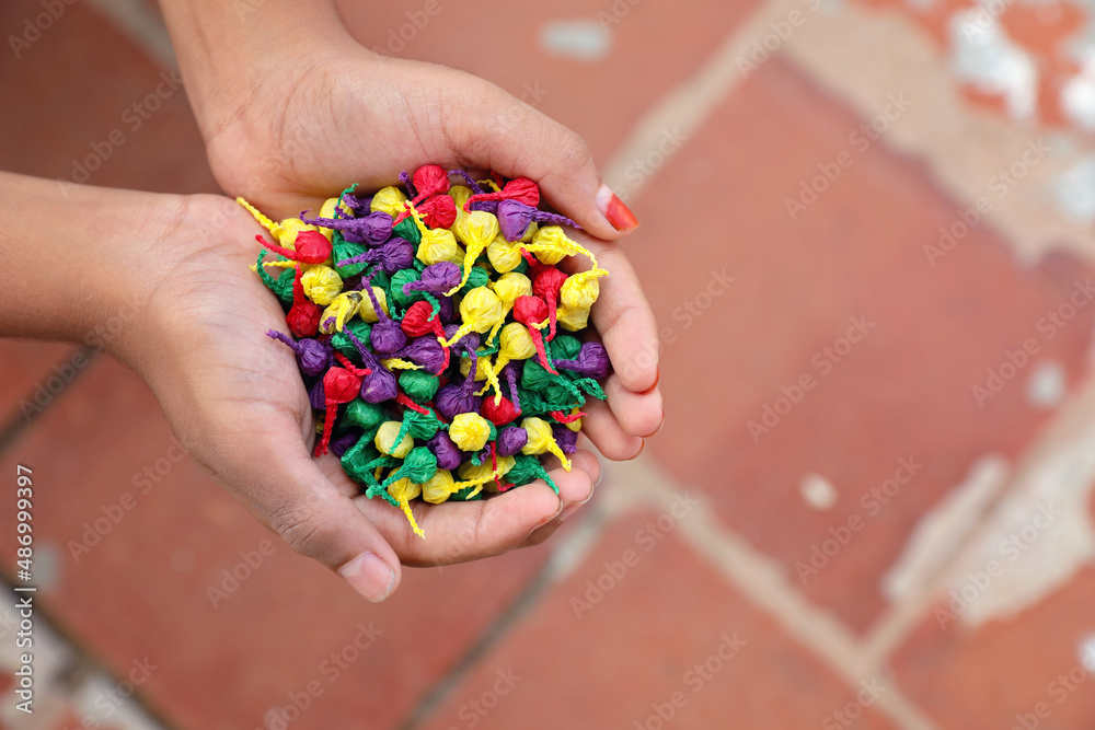 Boy holding Bang snaps or pop pops magical tricks crackers Stock Photo ...