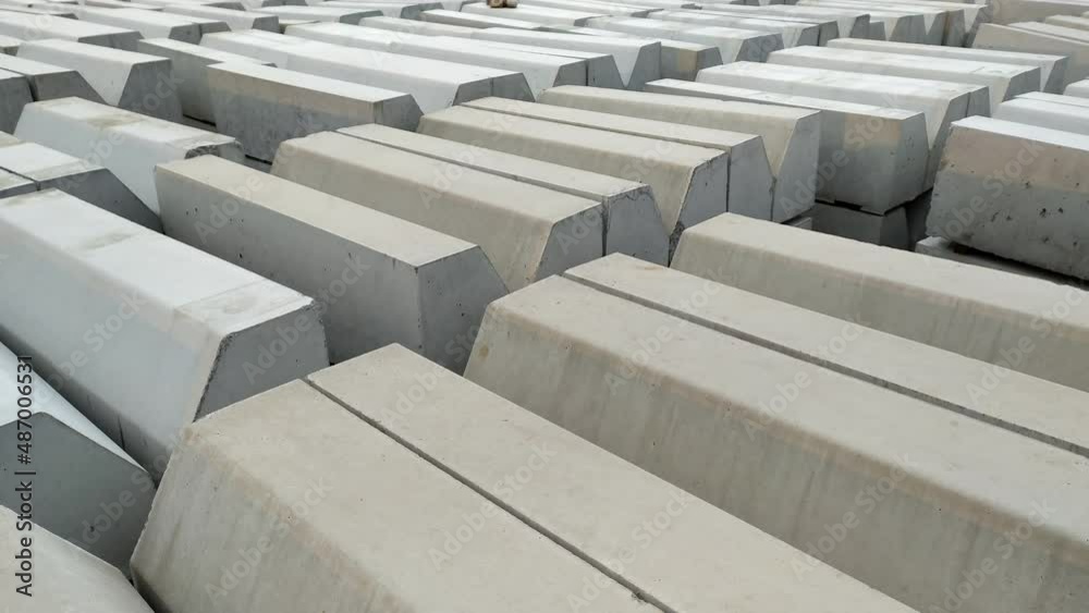Video Stock Curb blocks on the construction site of a road. Stack of ...