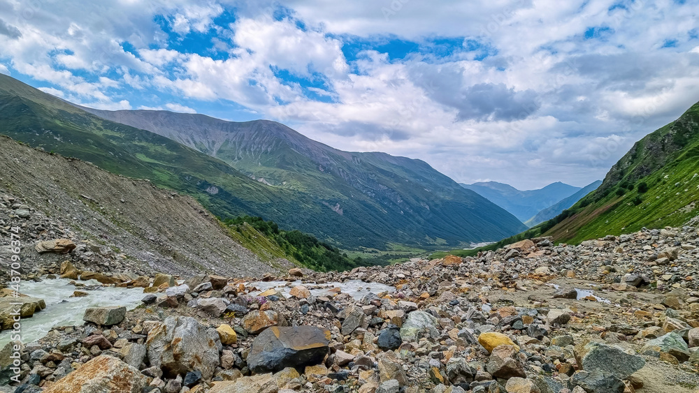 Patara Enguri River flowing down the a valley in the Greater Caucasus ...