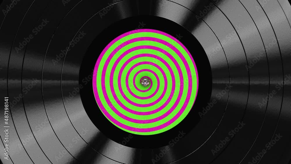 Realistic seamless looping 3D animation of the green and pink hypnotic ...