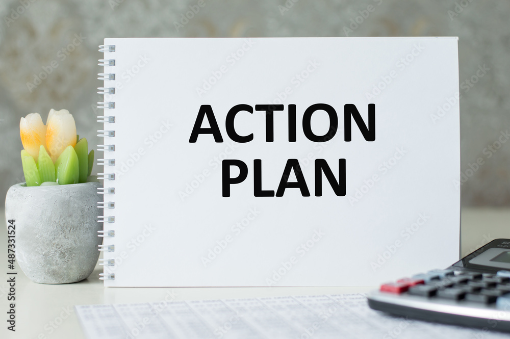 action plan text on notepad on desktop, business concept Stock Photo ...