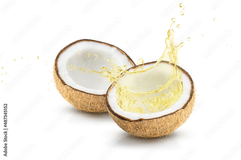 Coconut oil splash from coco nut fruit isolated on white background ...