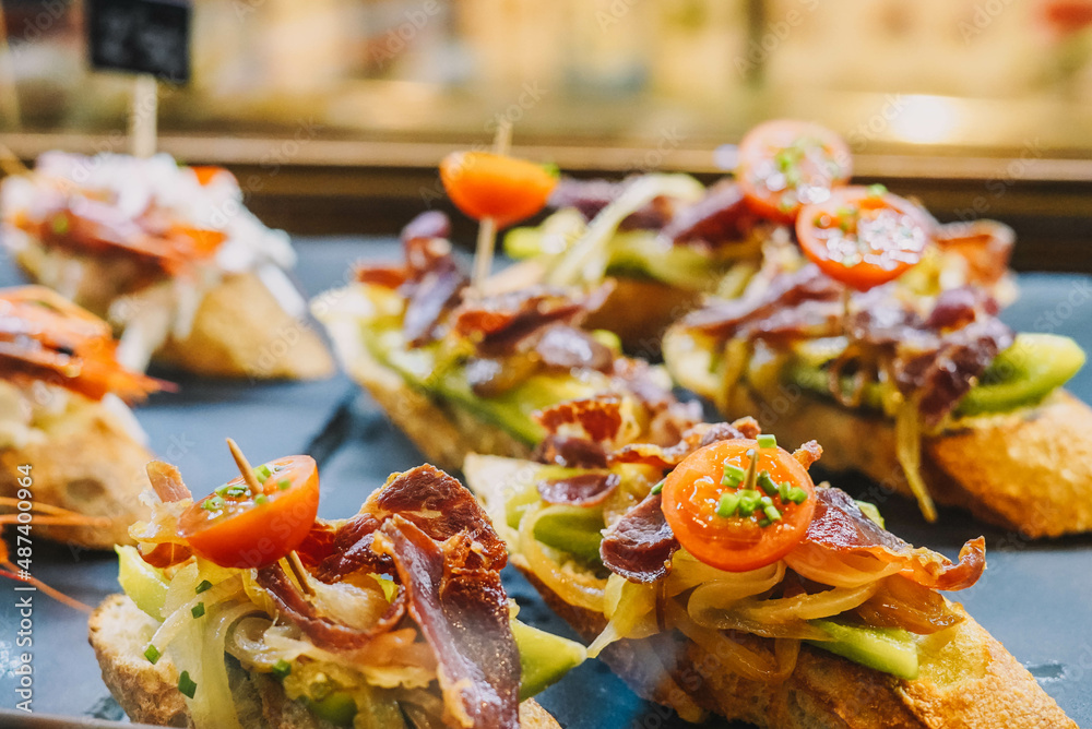 Different assorted canapes of bread with crab, ham and vegetables Stock ...