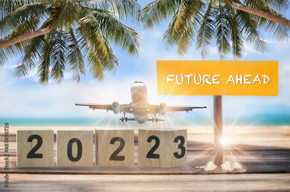 New year 2022 to 2023 and commercial plane with future ahead word on ...