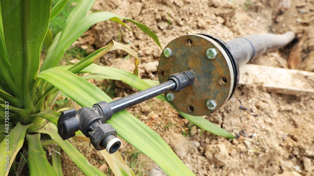 Sub-water pipe on the main pipe. A black sub PB compression pipe ...