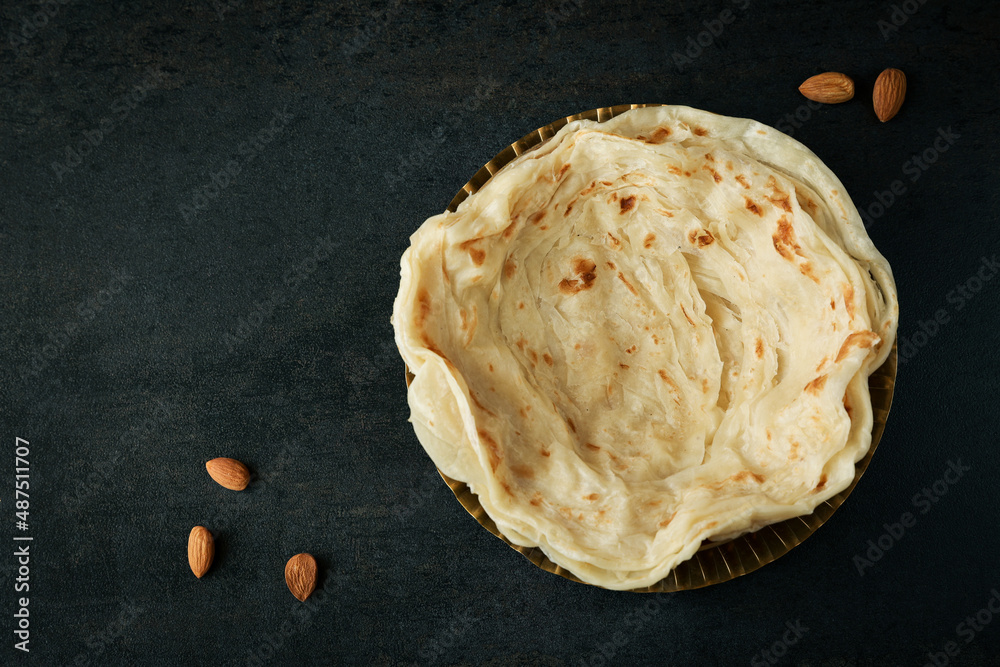 Kerala paratha porotta meat beef curry roti Malabar parotta barotta is ...