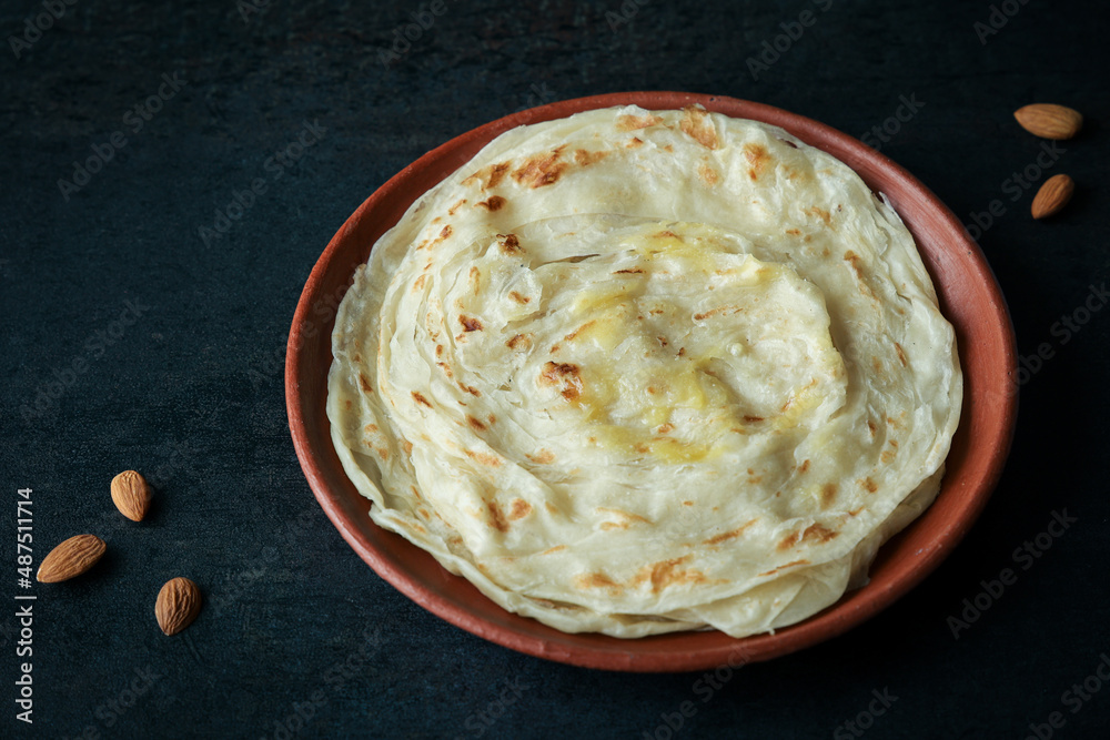 Kerala paratha porotta meat beef curry roti Malabar parotta barotta is ...