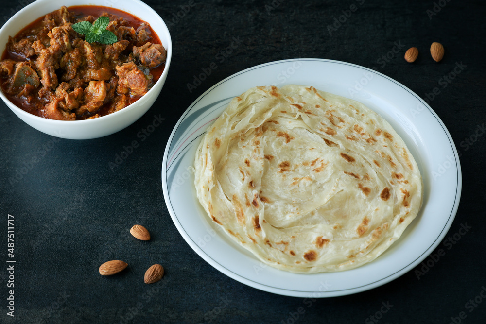 Kerala paratha porotta meat beef curry roti Malabar parotta barotta is ...