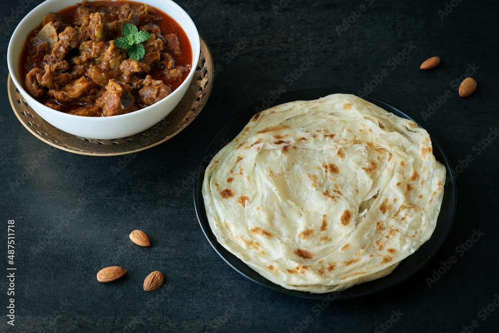 Kerala paratha porotta meat beef curry roti Malabar parotta barotta is ...