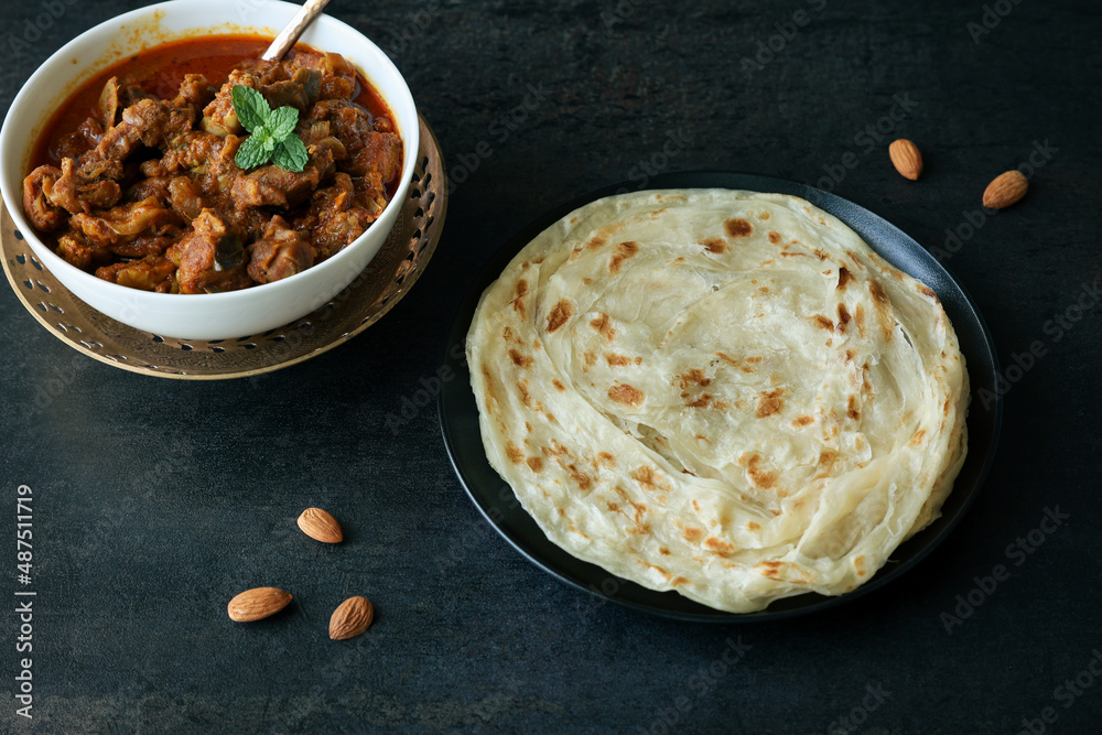 Kerala paratha porotta meat beef curry roti Malabar parotta barotta is ...