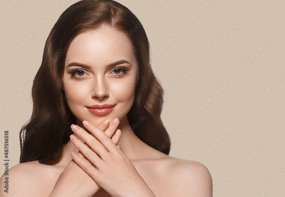 Beautiful woman white dress over brown background portrait with ...