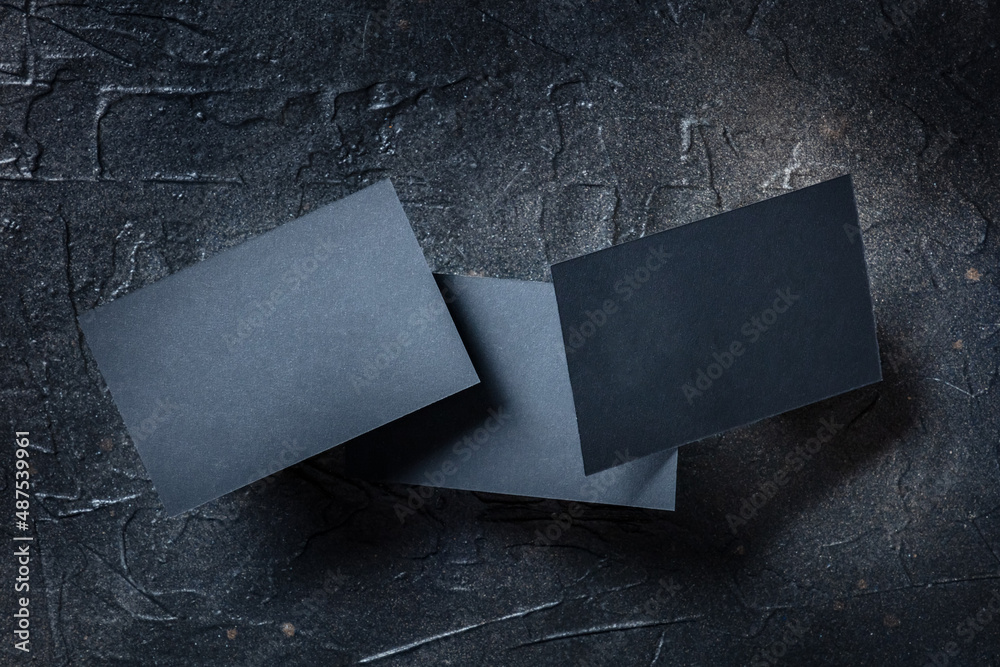 Black business card mock up on a dark background, a template for design ...