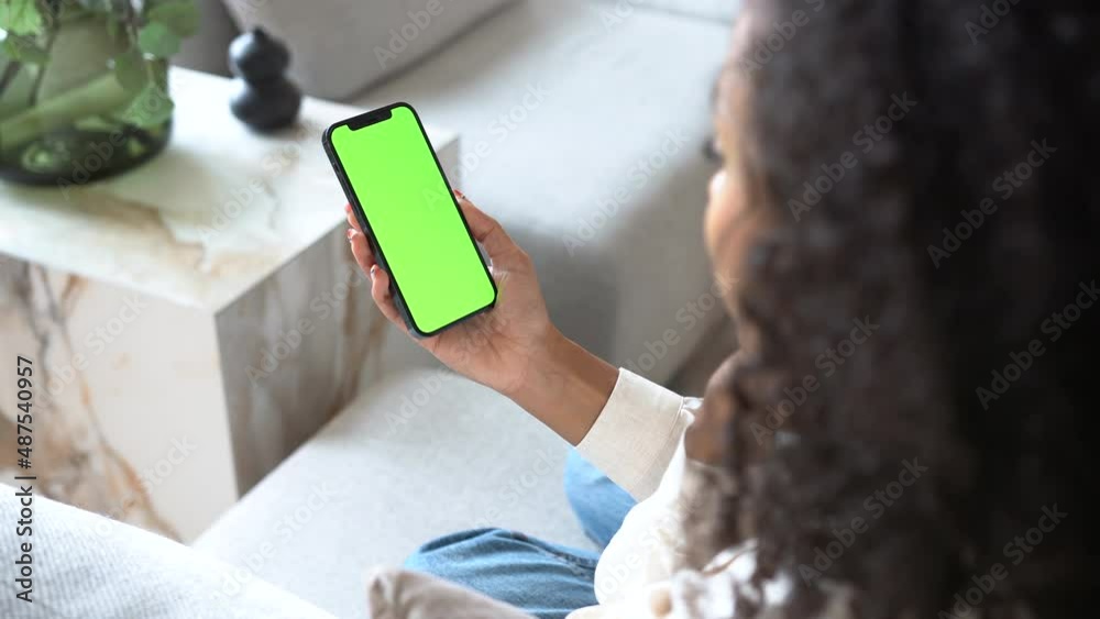 Back View of Woman at Phone with Green Screen for Copy Space. Chromakey ...