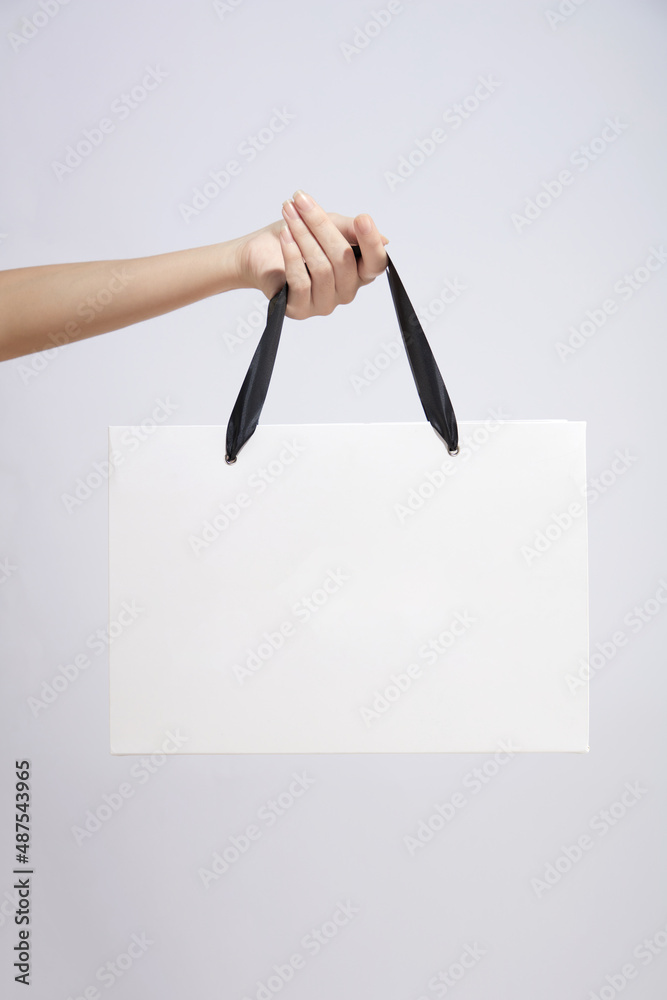 Hand model holding with a white background for pruduct advertising ...