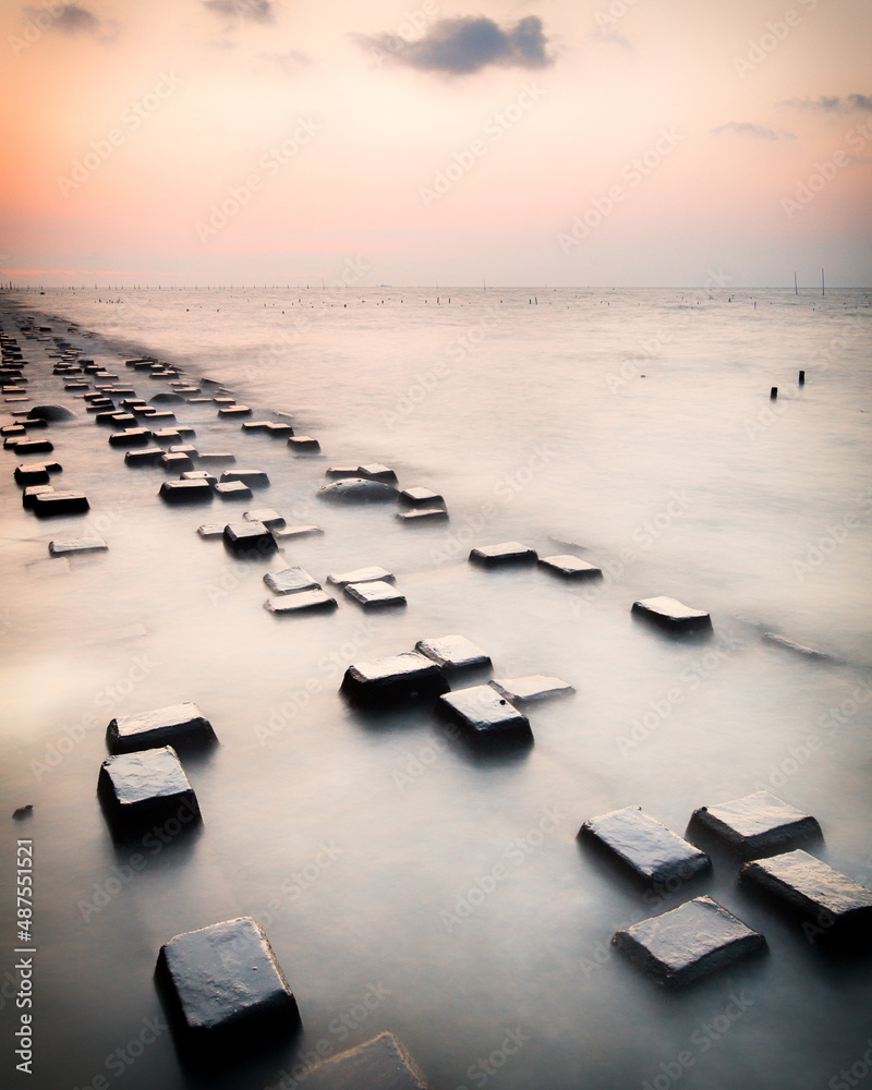 Beautiful landscape of sea level reflect fantasy dramatic sunset sky in ...