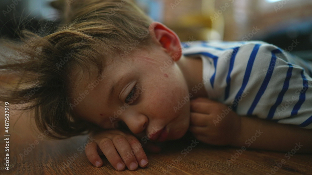 Drowsy child waking up from nap little boy awakening from sleep Stock ...