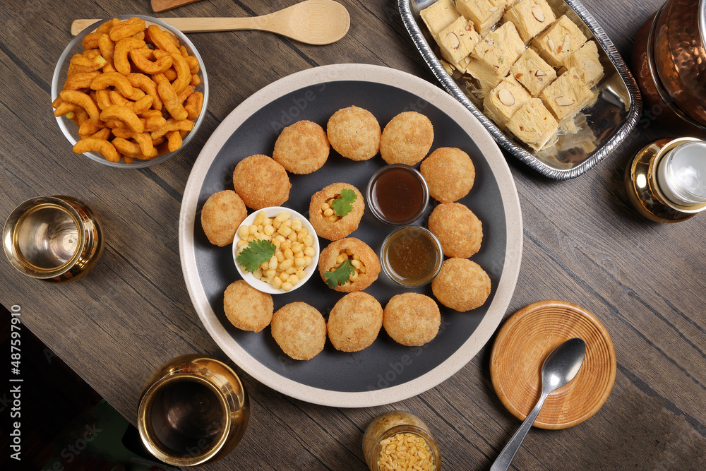 verity of indian bengali street food tea time snacks onion pakoda ...