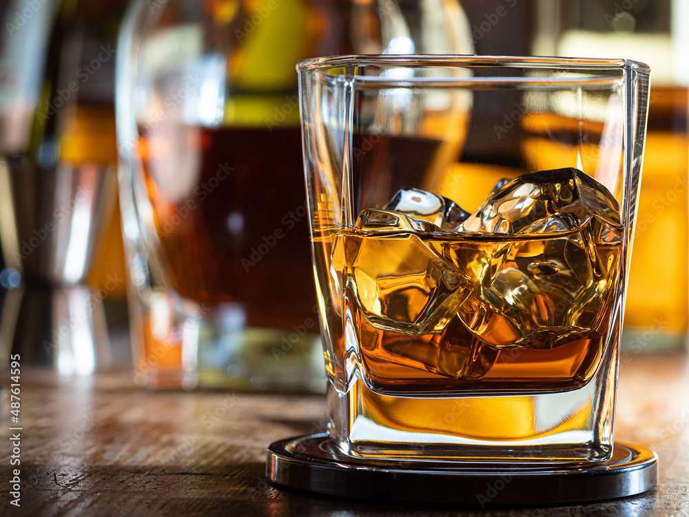 Glass of whisky on the rocks Stock Photo | Adobe Stock