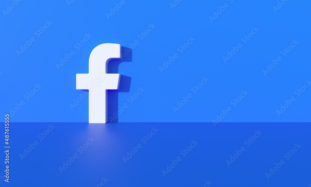 Facebook logo on blue wall background with hard shadow and space for ...