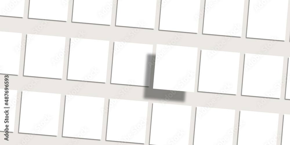 Pattern of Squared Blanks laying on Neutral grey background with one ...