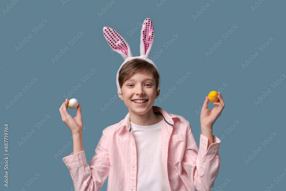 Easter boy funny portrait. Happy boy with Easter eggs Caucasian child ...