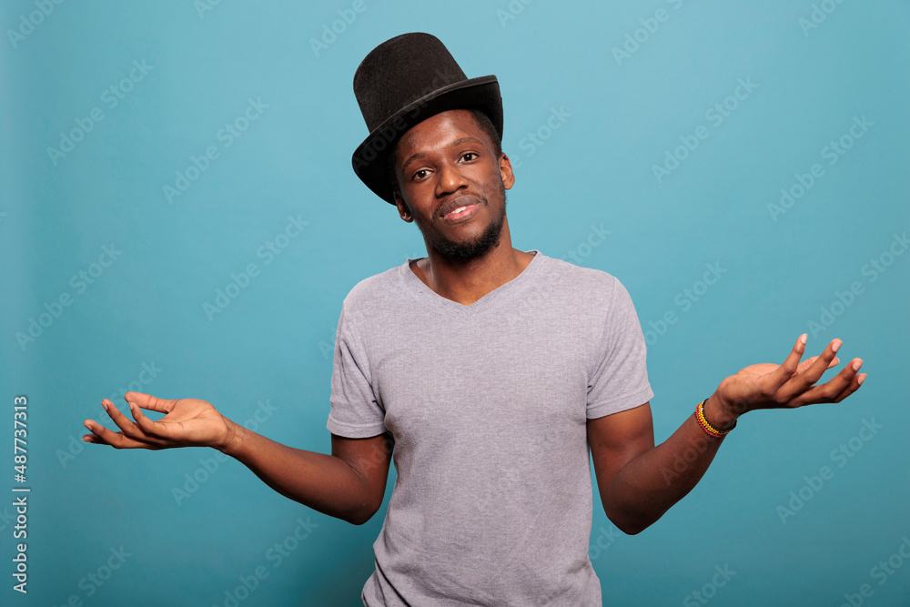 Artistic man wearing vintage top hat to create classic performance with ...