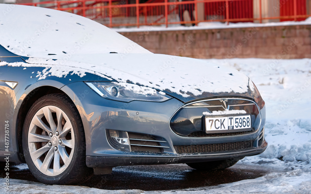 Minsk, Belarus. Feb 2022. Tesla Model S 85 parked at city street, snow ...