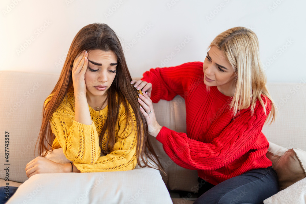 Sad women and supporting friends trying to solve a problem. Two sad ...