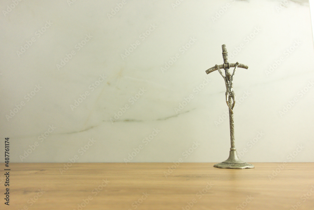 Crucified Jesus Christ figure on rustic background Stock Photo | Adobe ...