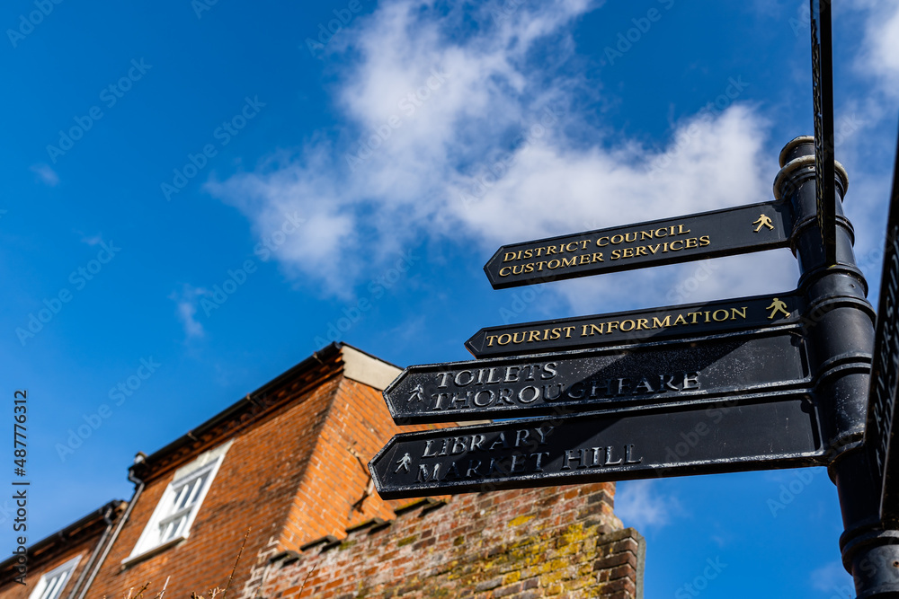 Poster Public information sign showing the direction to different ...